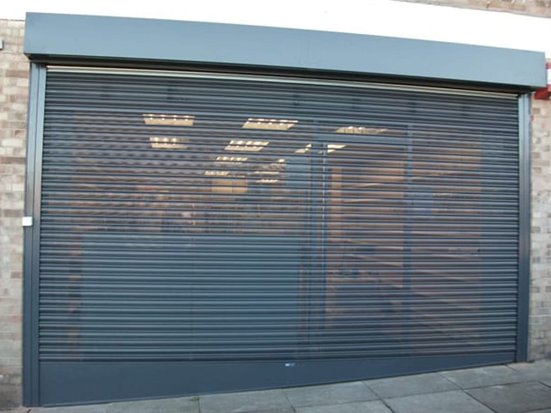 Perforated Shop Roller Shutter, South London - LondonRollerShutters.com